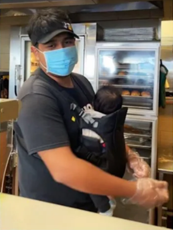 Subway Employee w/ Baby Strapped on his Chest Elicits Reactions Online