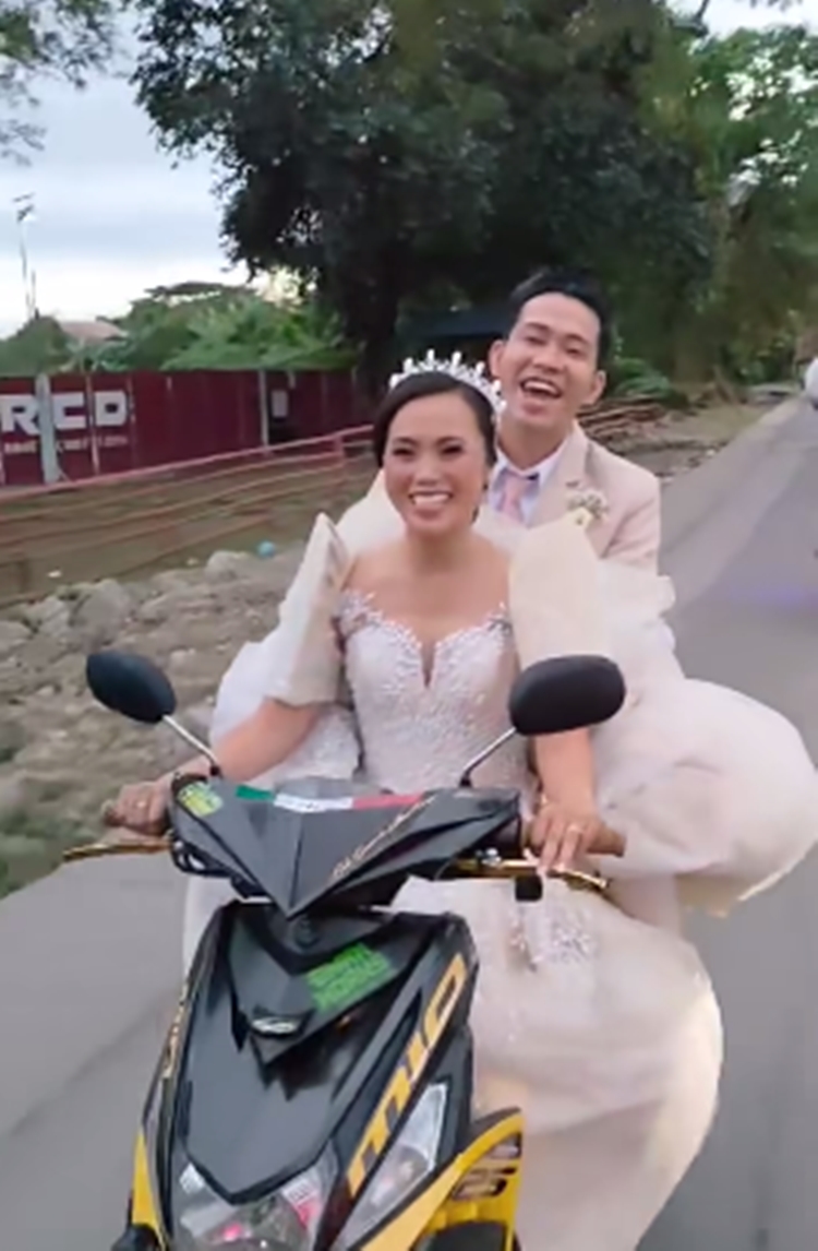 Newlywed Couple Rides Motorcycle on Their Way to Reception