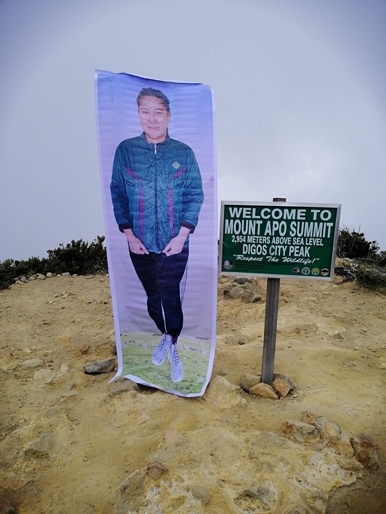 Woman Appears to Reach Mount Apo Summit with Help from Friends
