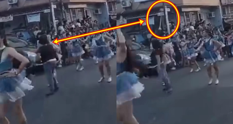Woman Passing by Hit with Majorette Dancer's Baton; Grabs and Thrown it ...