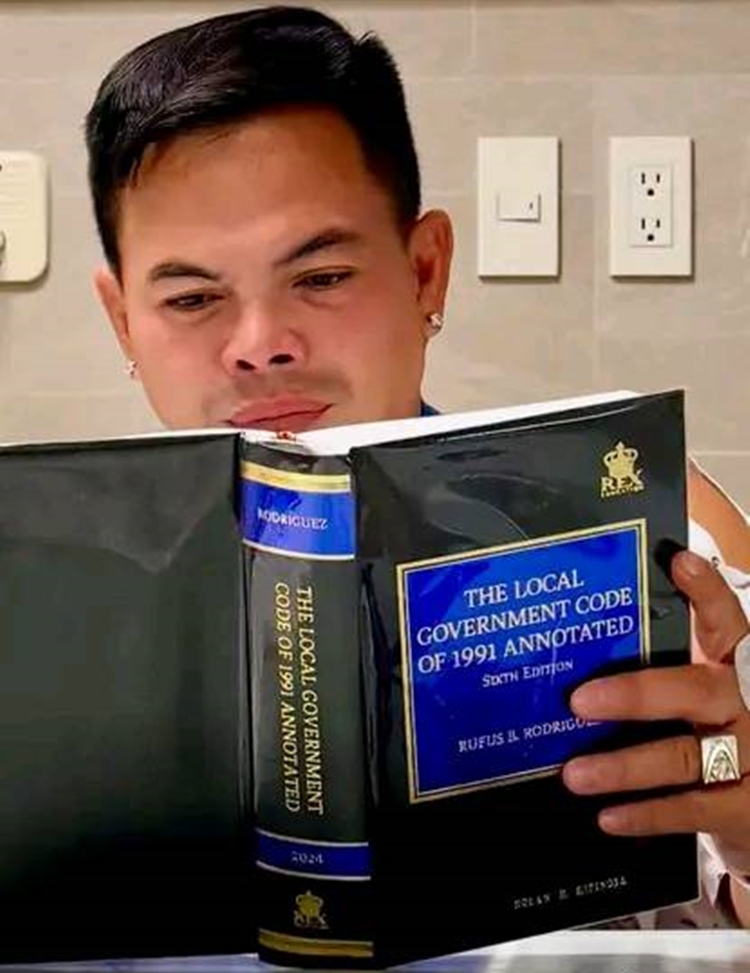 Kerwin Espinosa Shares Photo Reading the Local Government Code | Newspapers
